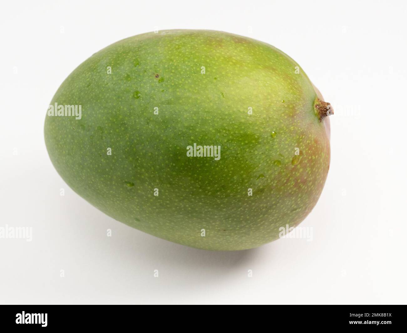 Ripe mango on a white background. Fresh mango. Close-up Stock Photo - Alamy