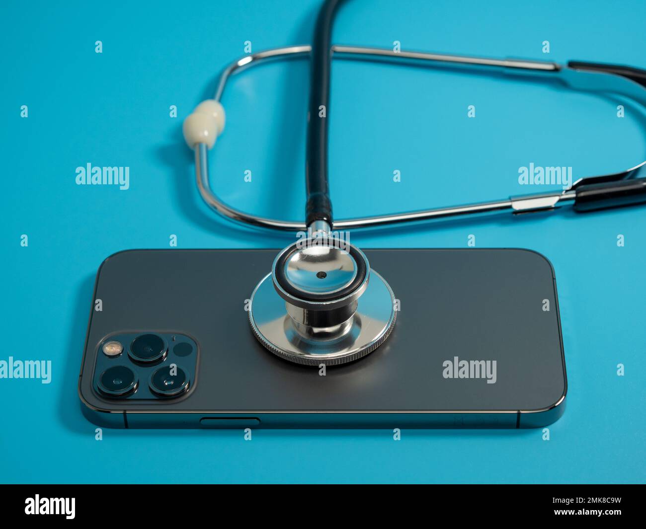 Smartphone and medical stethoscope. Smartphone diagnostics and repair ...