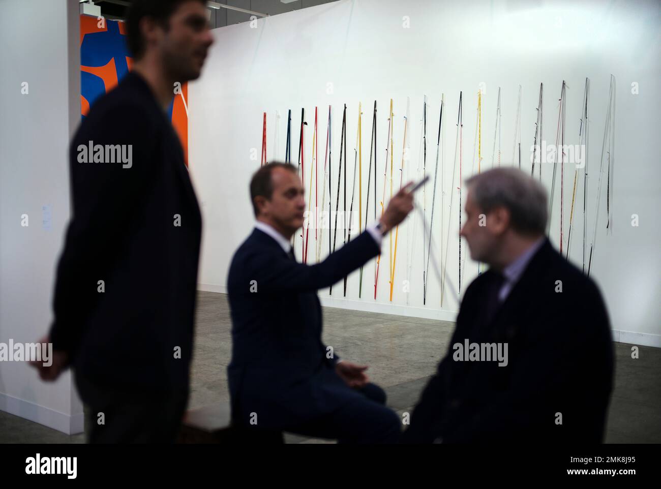 People gather in front of an artwork created by Brazilian artist Jac ...