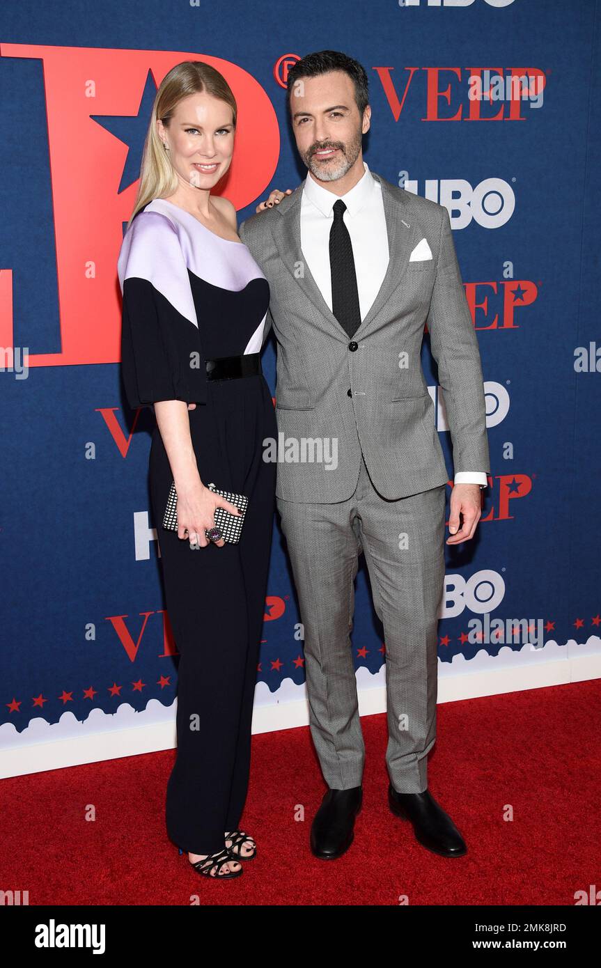 Actors Reid Scott, right, and wife Elspeth Keller attend the premiere ...
