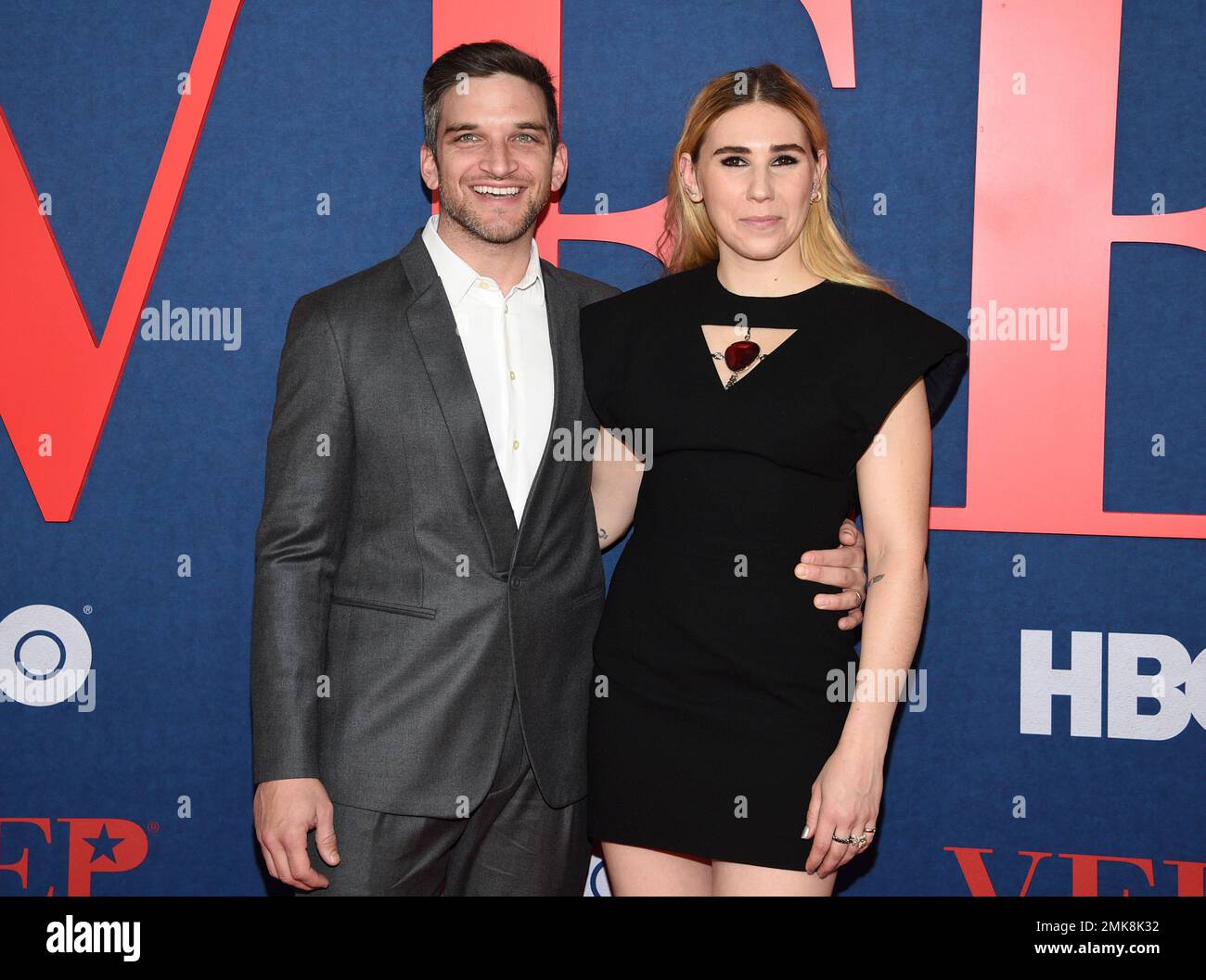 Actors Evan Jonigkeit, left, and Zosia Mamet attend the premiere of the ...
