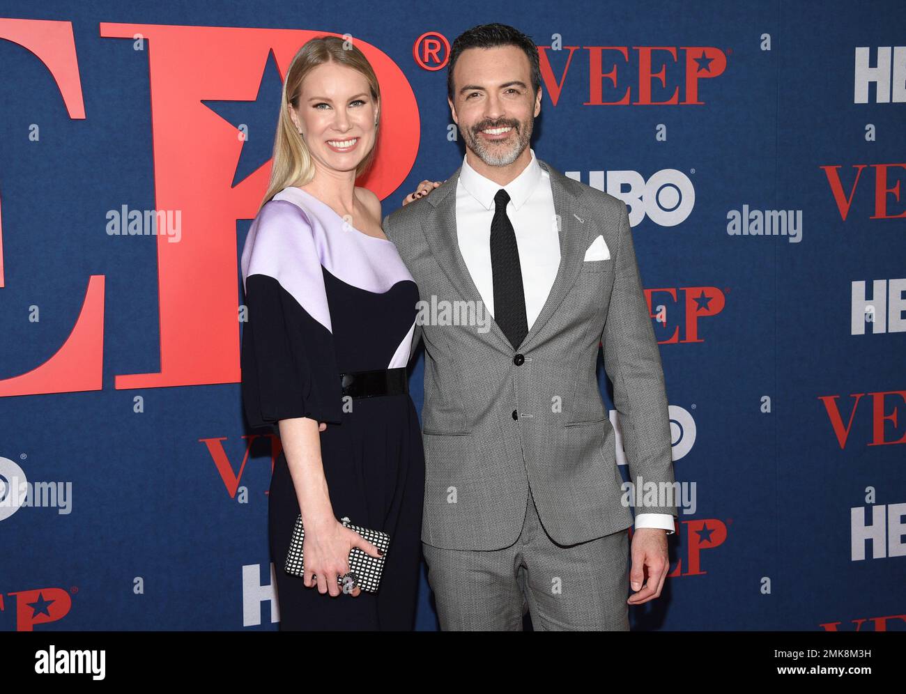 Actors Reid Scott, right, and wife Elspeth Keller attend the premiere ...