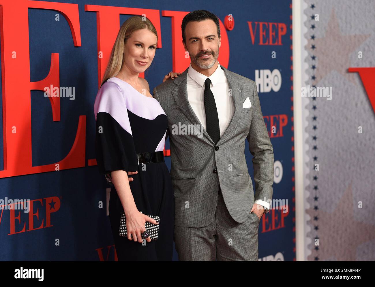 Actors Reid Scott, right, and wife Elspeth Keller attend the premiere ...