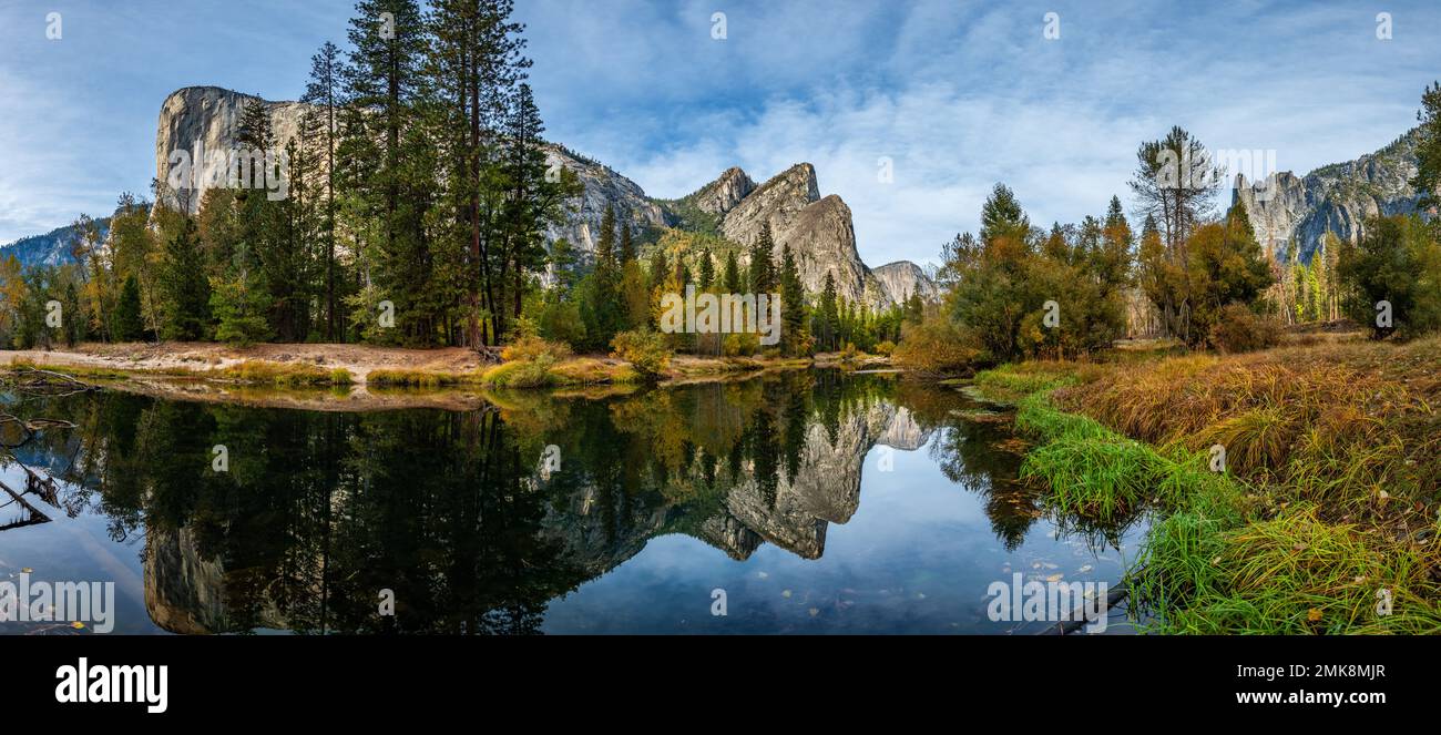 The famous Three Brothers rock formation along the Merced River in ...
