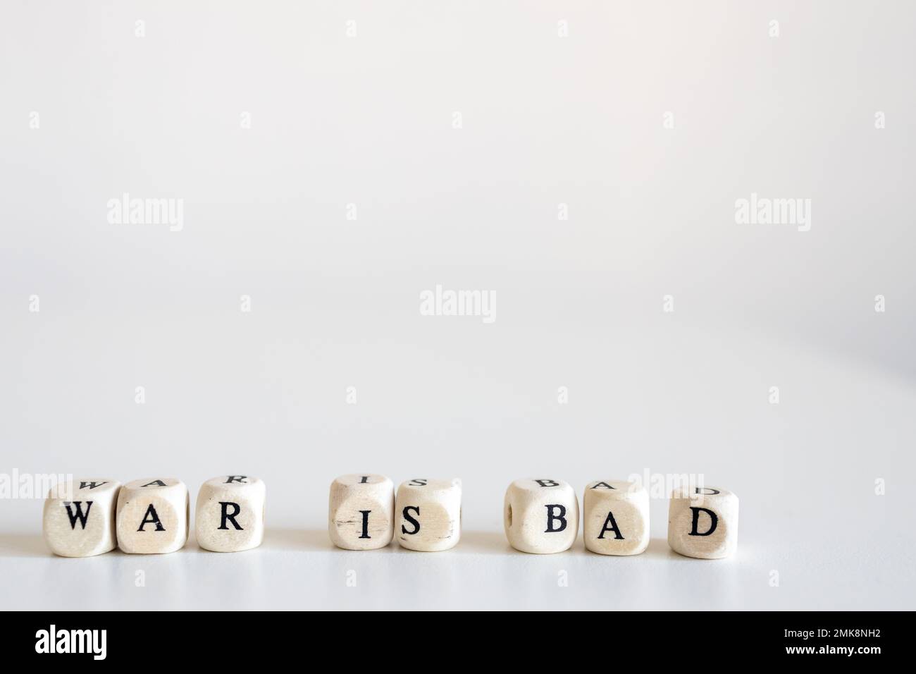 Word war is bad made up of wooden cubes isolated on white background ...