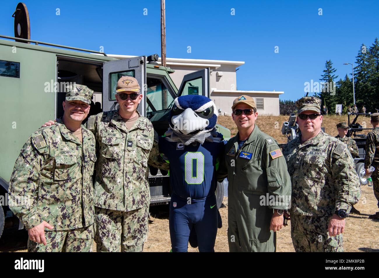 From left to right, Command Master Chief Travis Brown, Capt. Rich ...