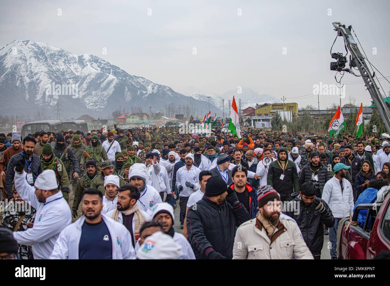 People walk along the Indian Congress Leader Rahul Gandhi and former ...