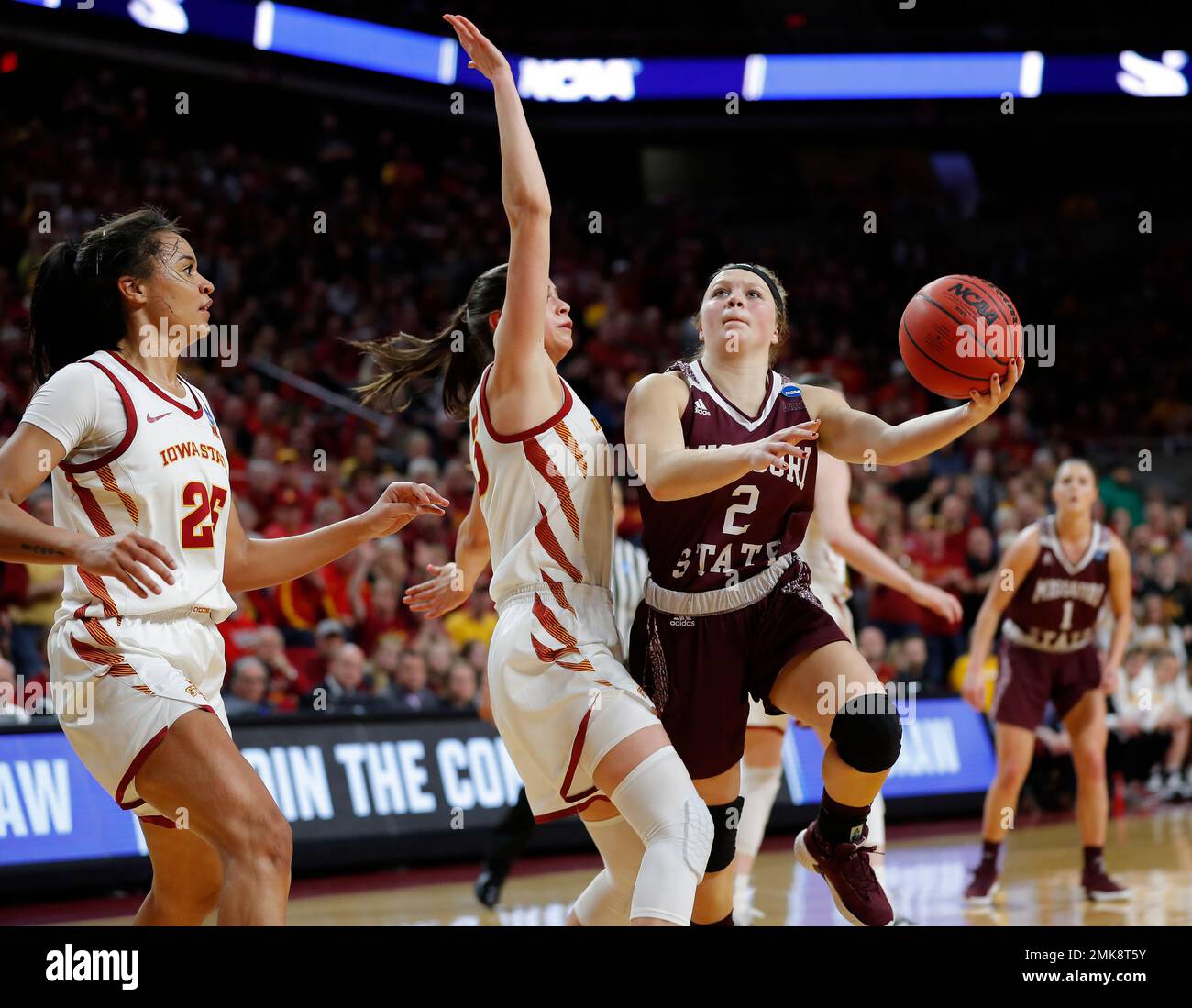 Missouri State guard Elle Ruffridge, right, drives into the lane as ...