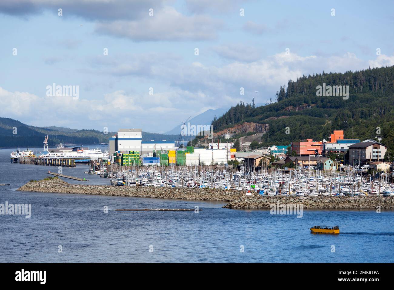 The Summer view of marina full of sailboats and industrial port with ...