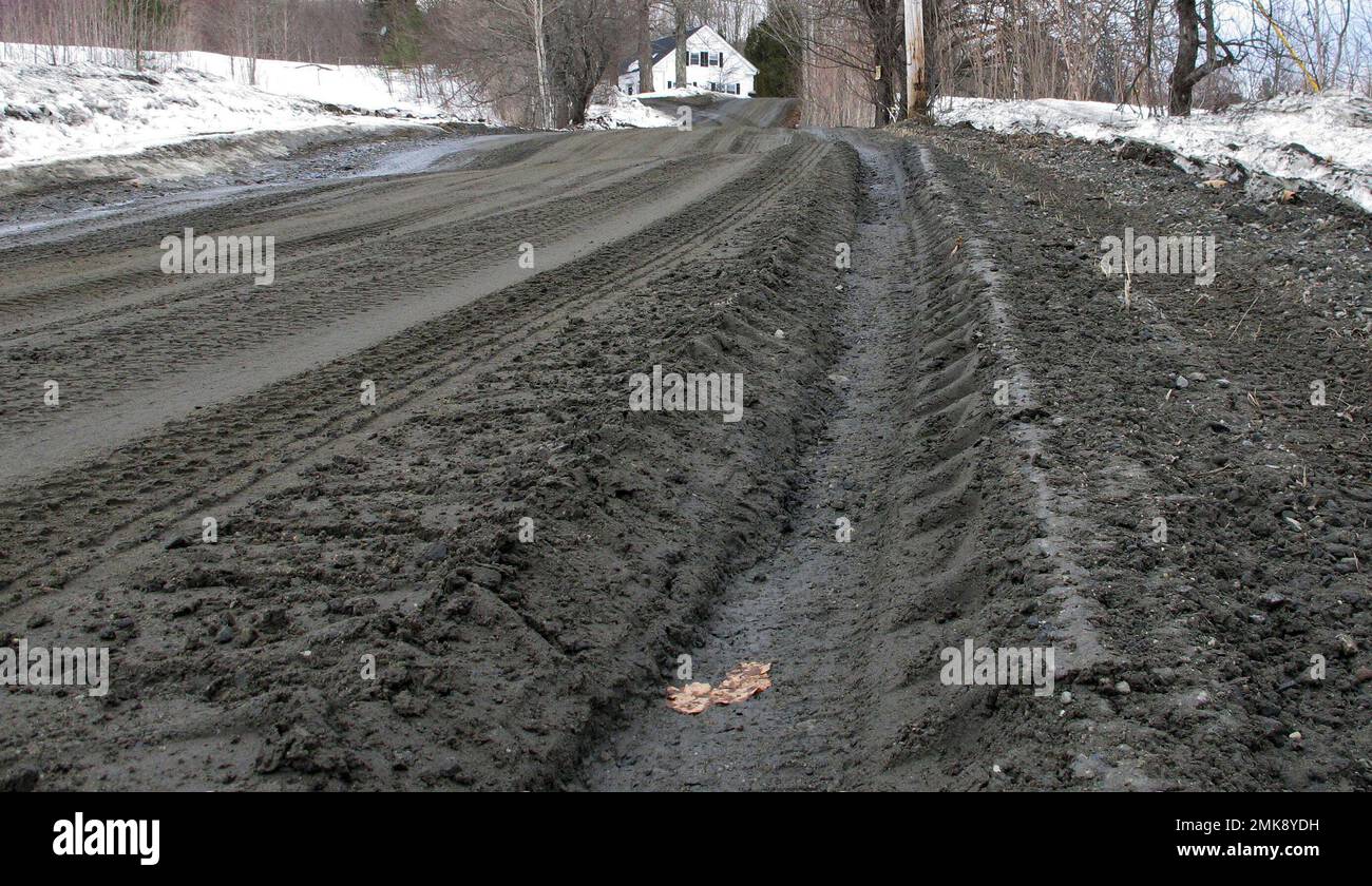 This March 21, 2019, photo shows a tire rut in a muddy dirt road in ...