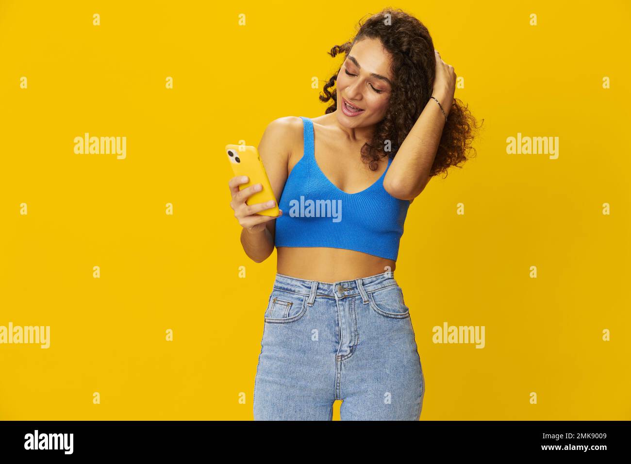 Influencer woman with phone in hand taking selfies talking on video ...