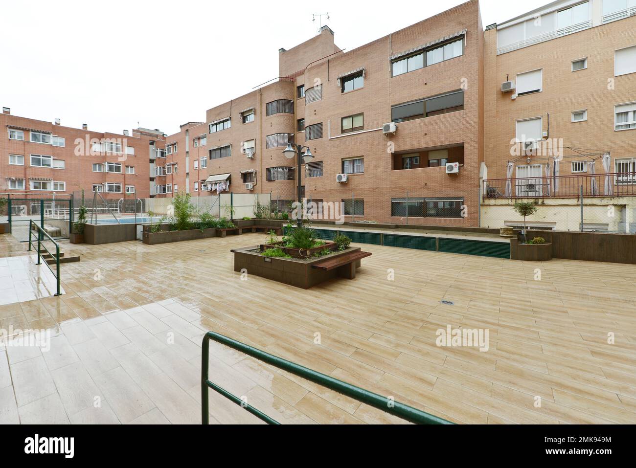 Interior common areas of an interior block patio with a swimming pool ...