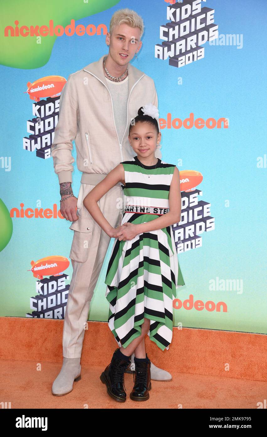 Machine Gun Kelly, left, and his daughter Casie Colson Baker arrive at the Nickelodeon Kids ...