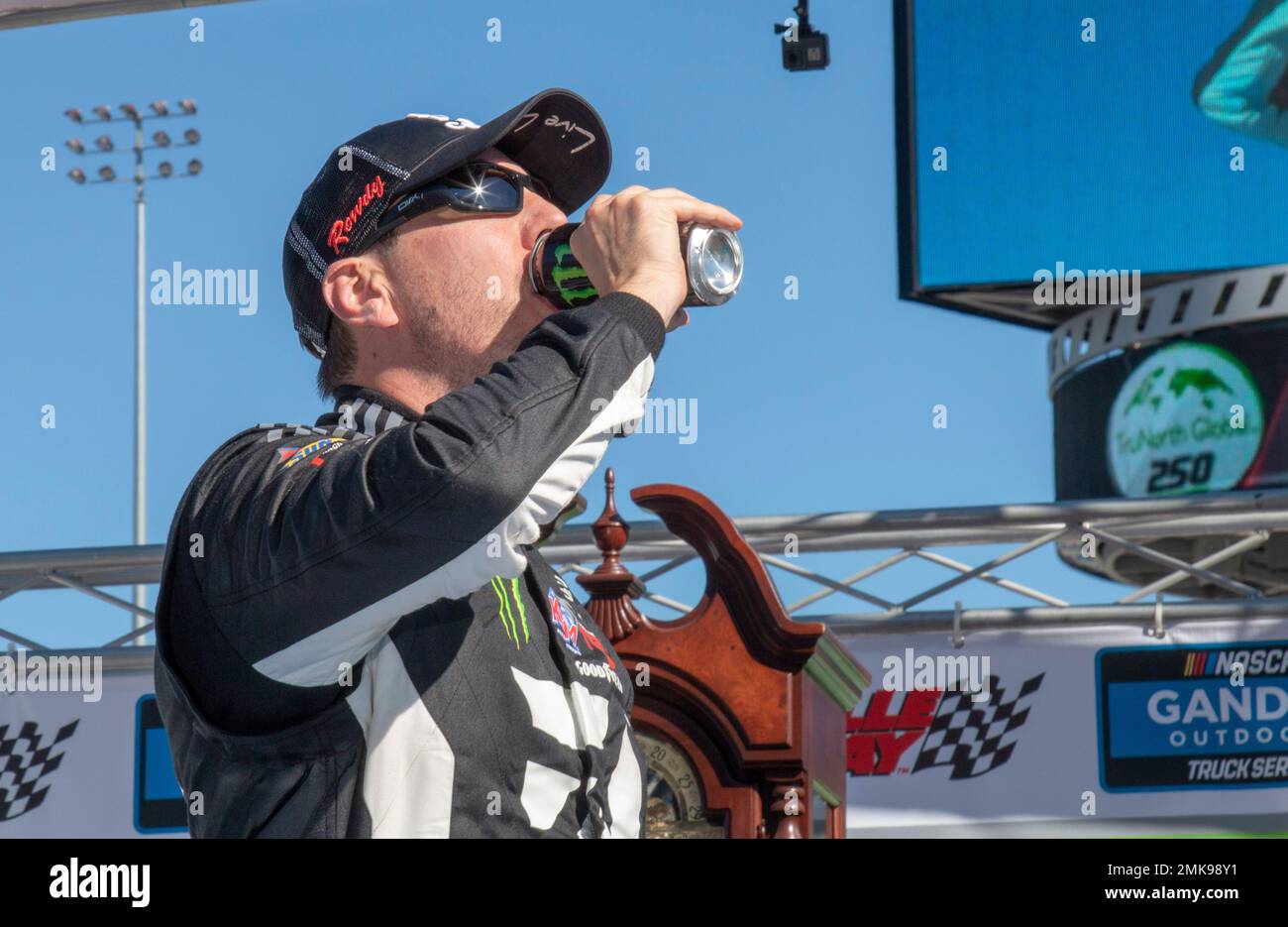 Kyle Busch enjoys a Monster Energy Drink during the NASCAR Gander ...