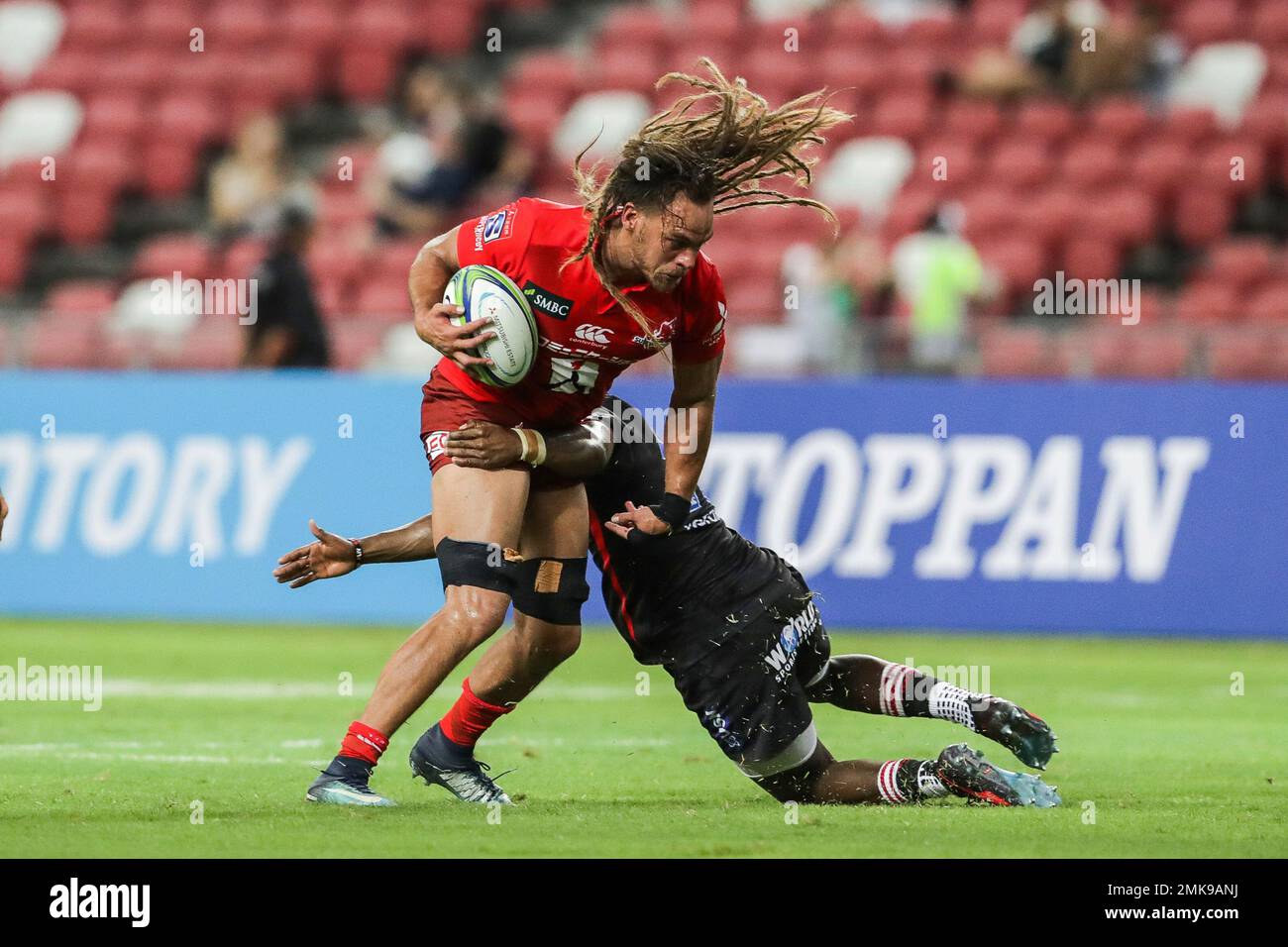 CAPTION CORRECTS THE DATE - Dan Pryor avoids a tackle from Lionel Mapoe ...