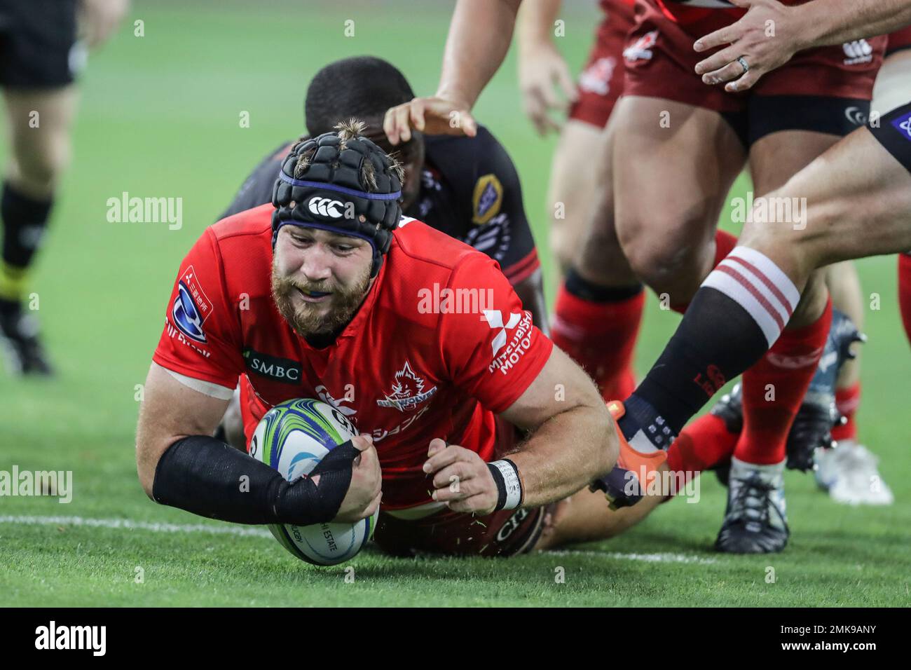 CAPTION CORRECTS THE DATE -Tom Rowe gets tackled while driving the ball ...