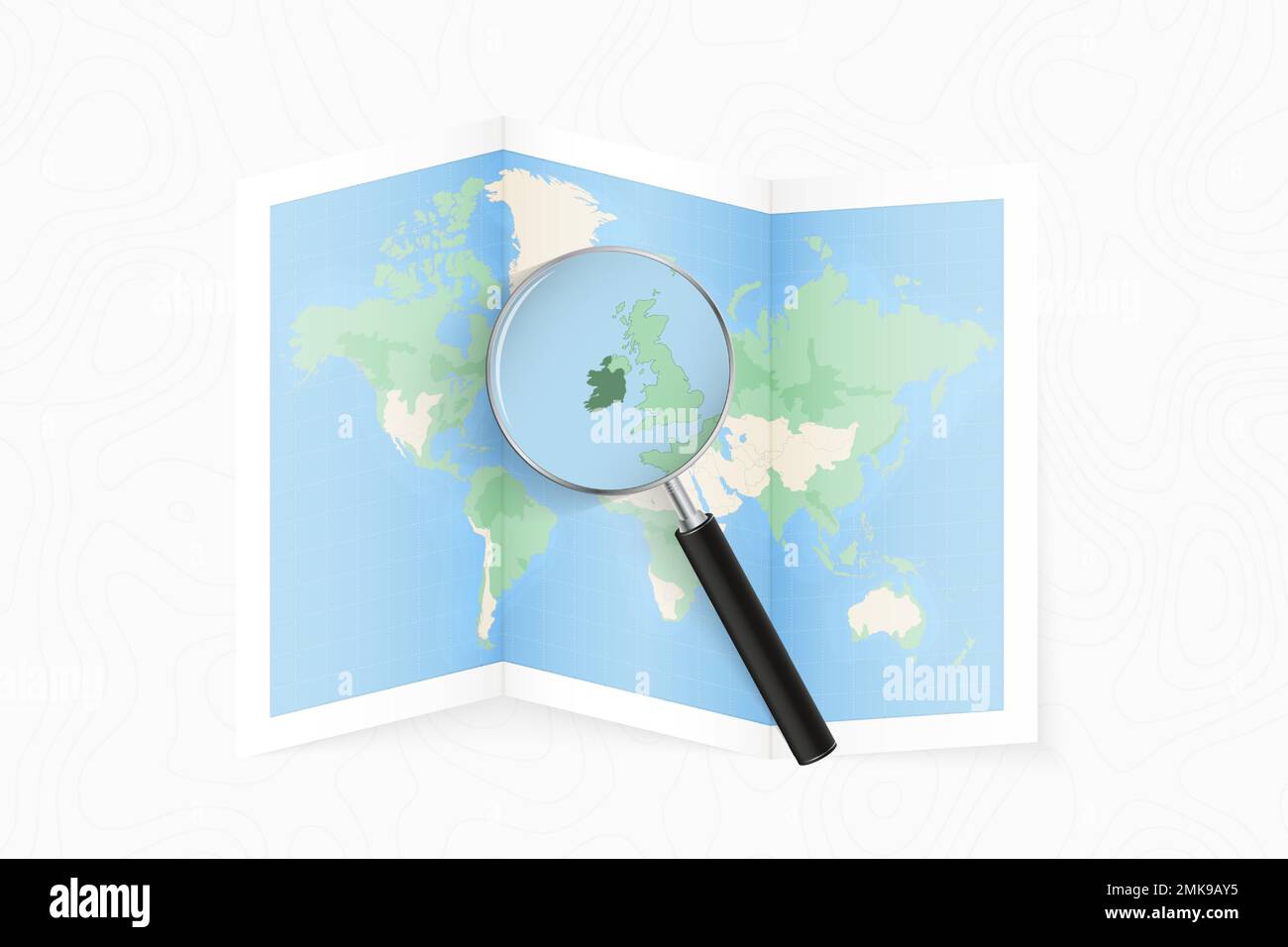 Enlarge Ireland with a magnifying glass on a folded map of the world ...