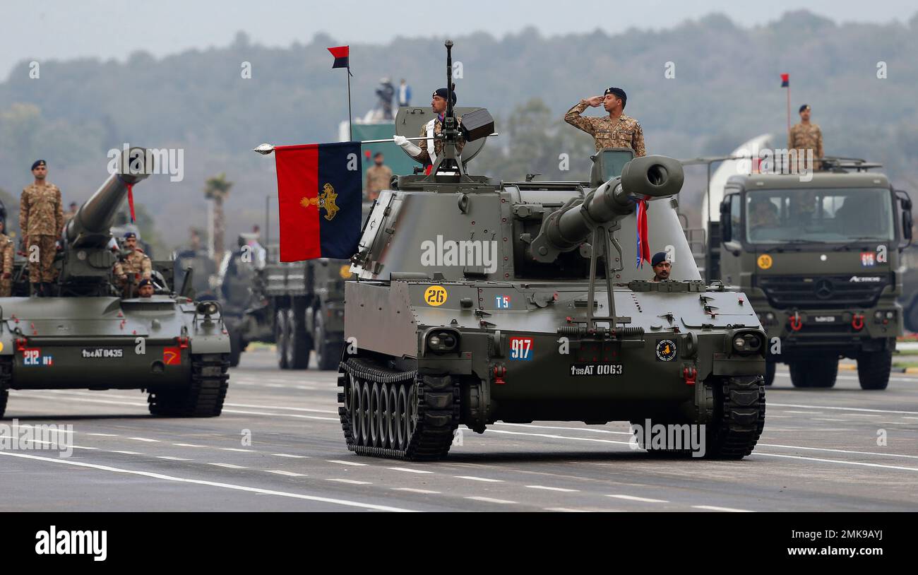 Pakistani-made tanks roll down during a military parade to mark ...