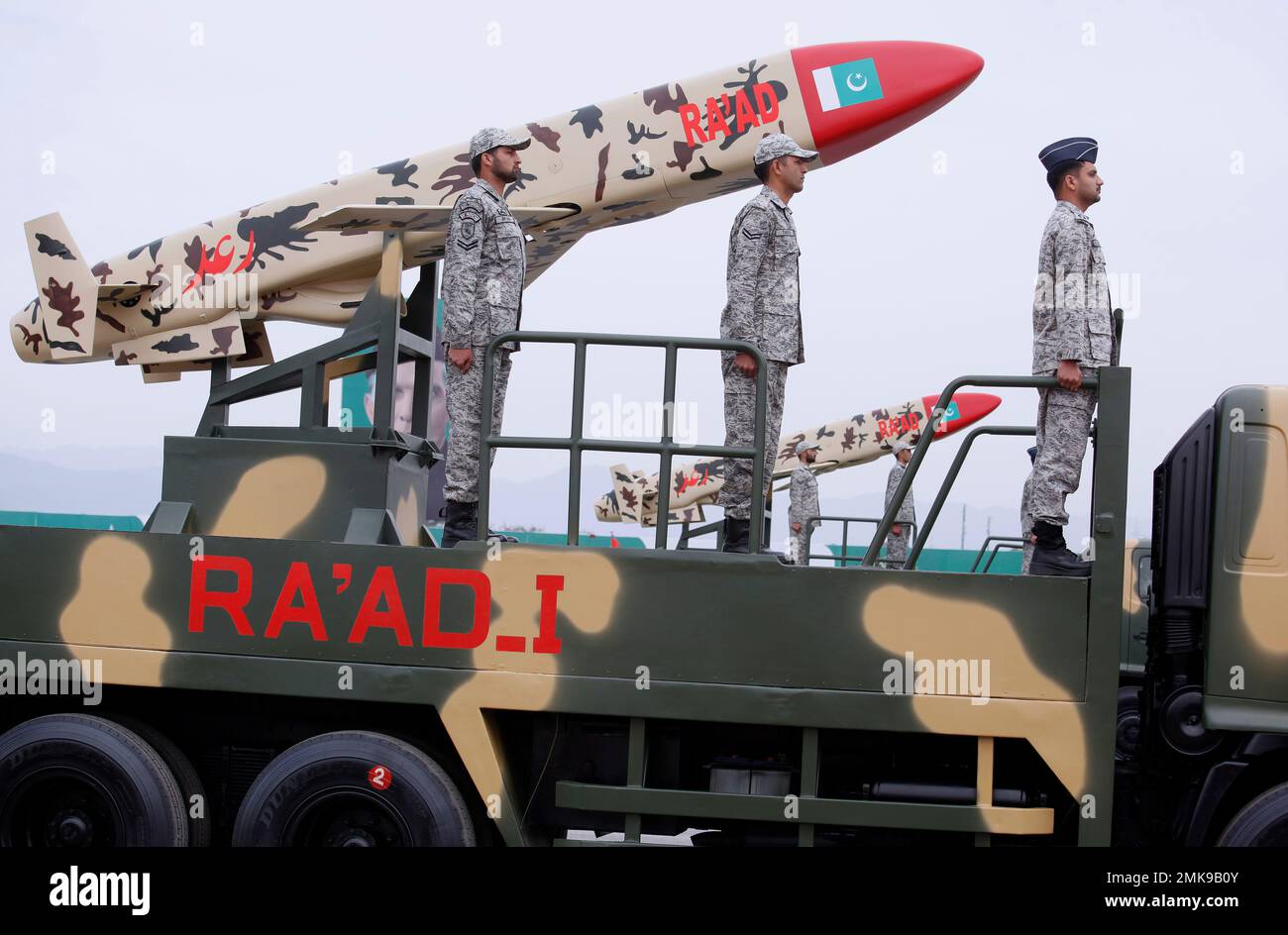 A Pakistani-made Cruise missile Ra'ad is loaded on a trailer rolls down ...