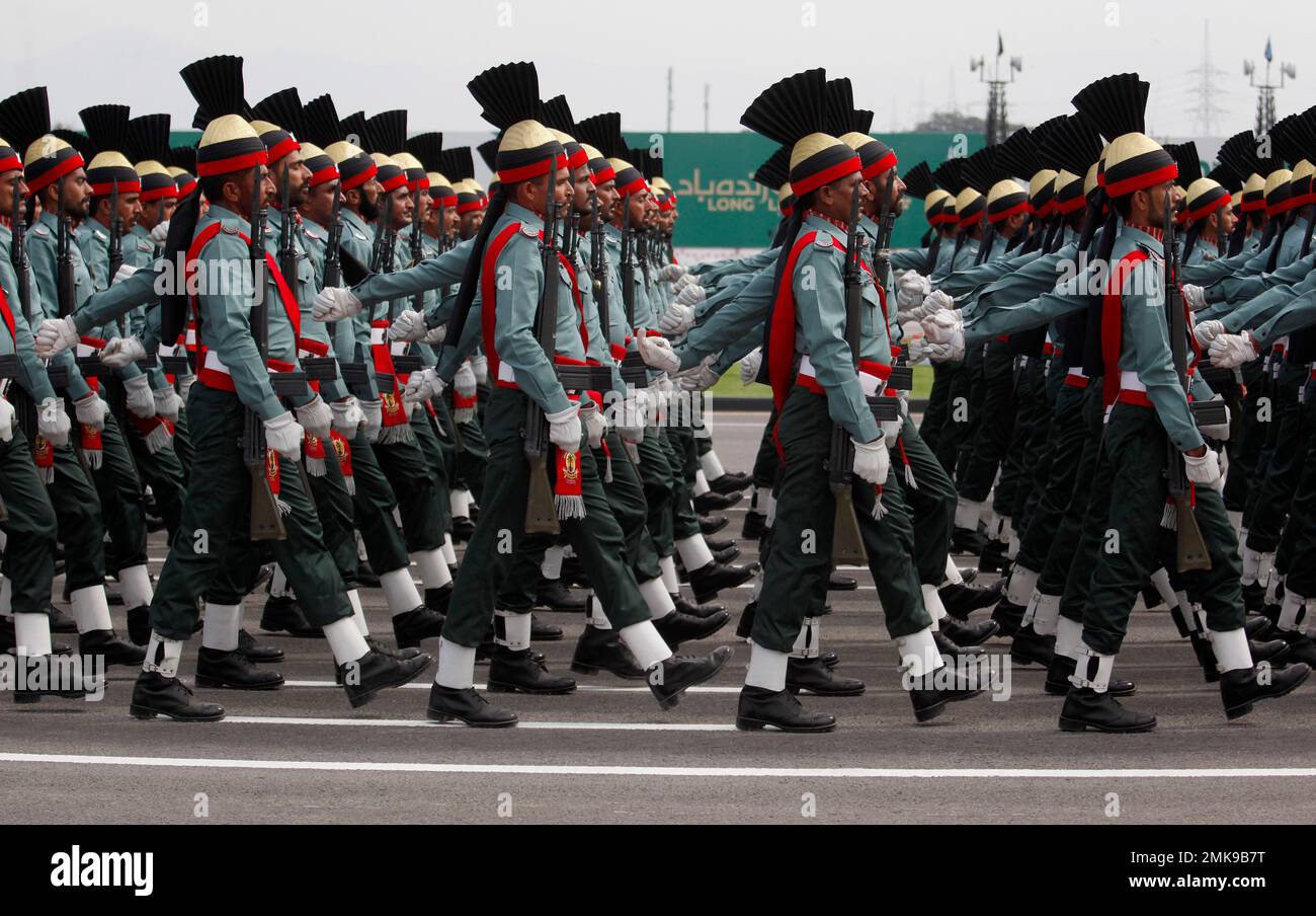 Pakistani paramilitary troops march during a military parade to mark ...