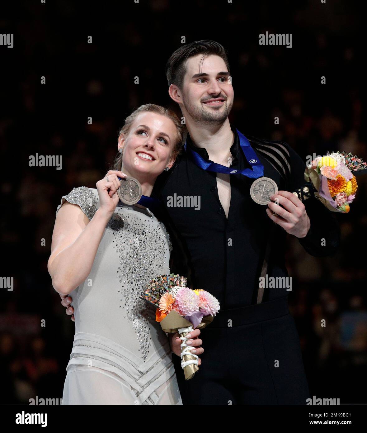 Madison Hubbell and Zachary Donohue of the U.S. display their bronze ...