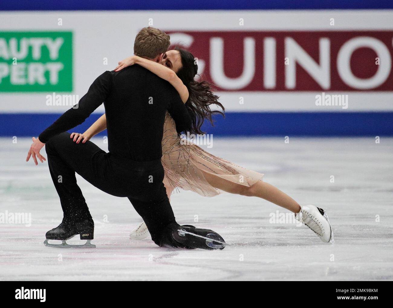 Madison Chock and Evan Bates of the U.S. perform their ice dance free ...
