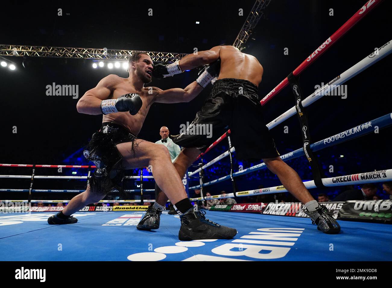 Karol Itauma in action against Ezequiel Osvaldo Maderna at the OVO ...