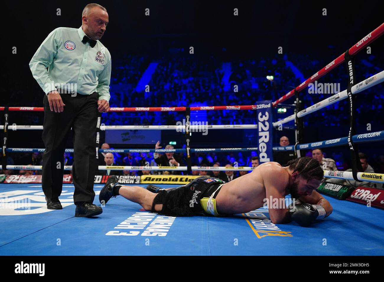 Karol Itauma is knocked to the floor by Ezequiel Osvaldo Maderna at the ...