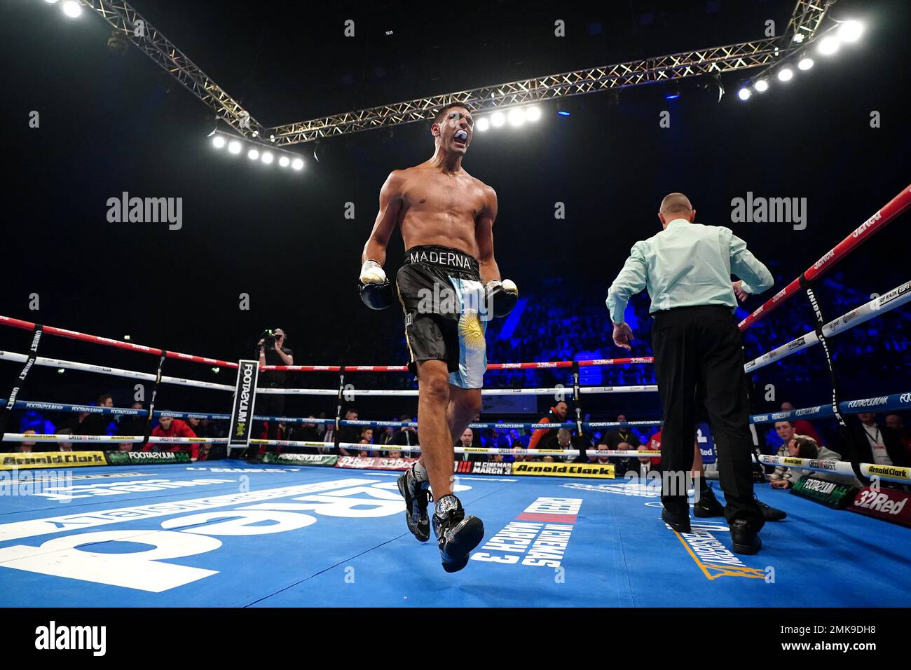 Ezequiel Osvaldo Maderna celebrates victory over Karol Itauma at the ...