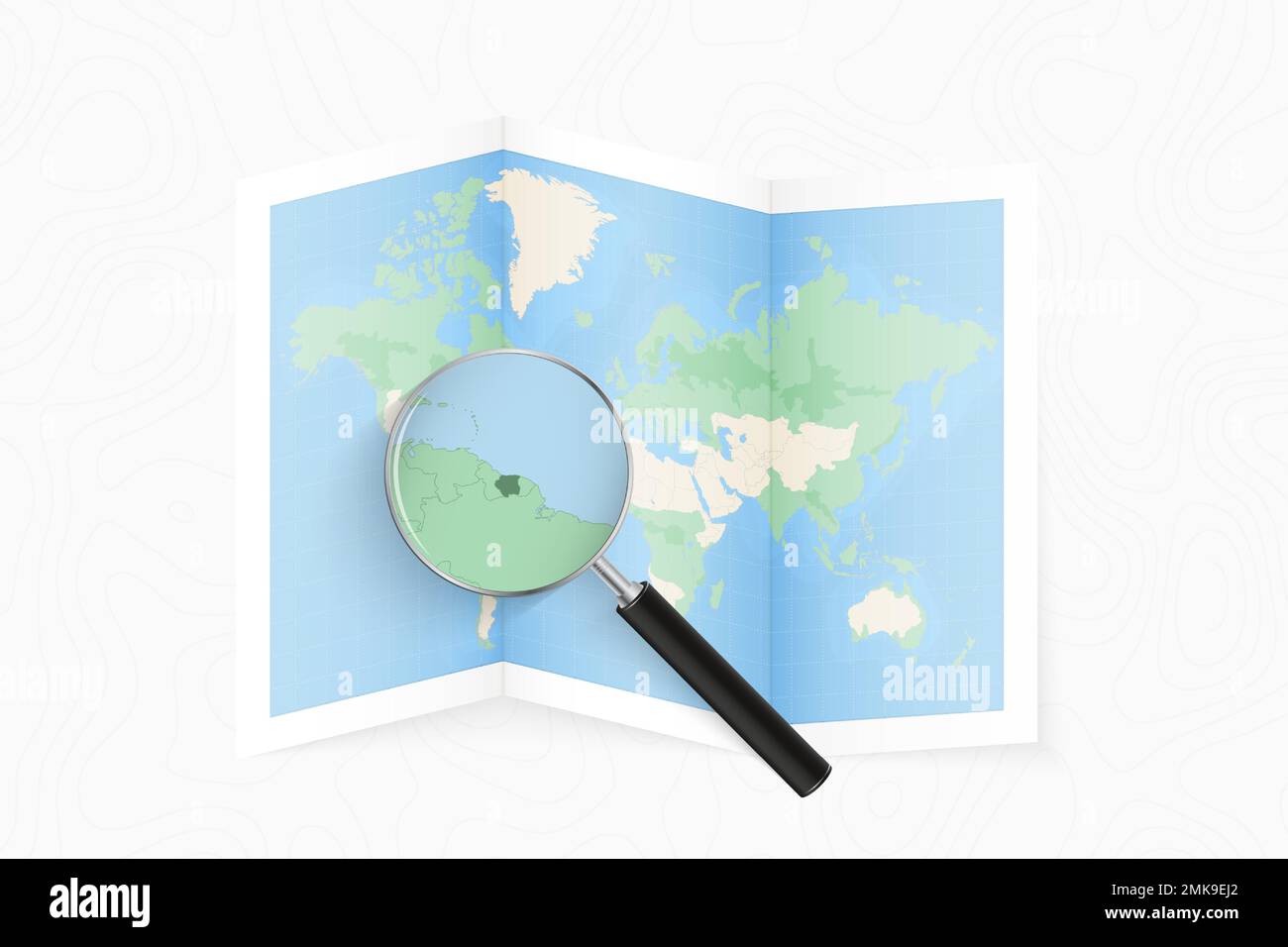 Enlarge Suriname with a magnifying glass on a folded map of the world ...