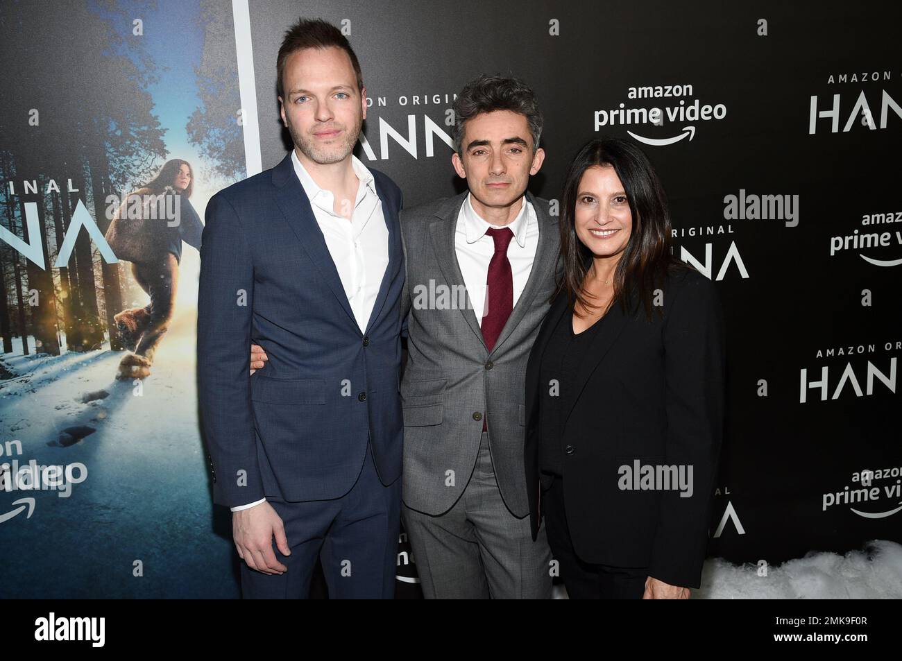Amazon's Jill Arthur, left, and Marc Resteghini pose with writer and ...