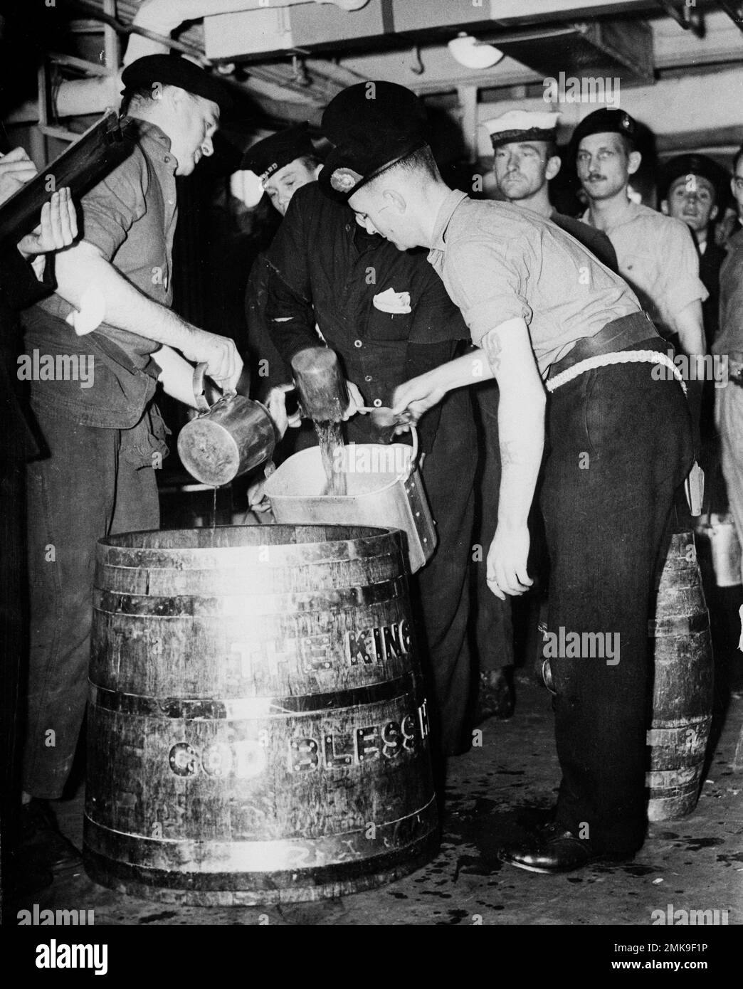 Men of the Royal Navy and Royal Marines of the HMS Vanguard line up for ...