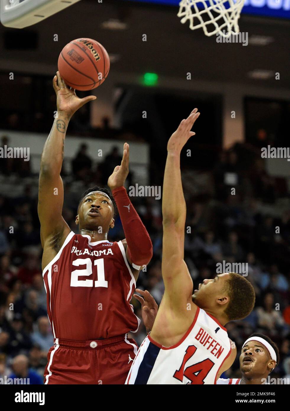 Oklahoma's Kristian Doolittle (21) shoots over Mississippi's KJ Buffen ...