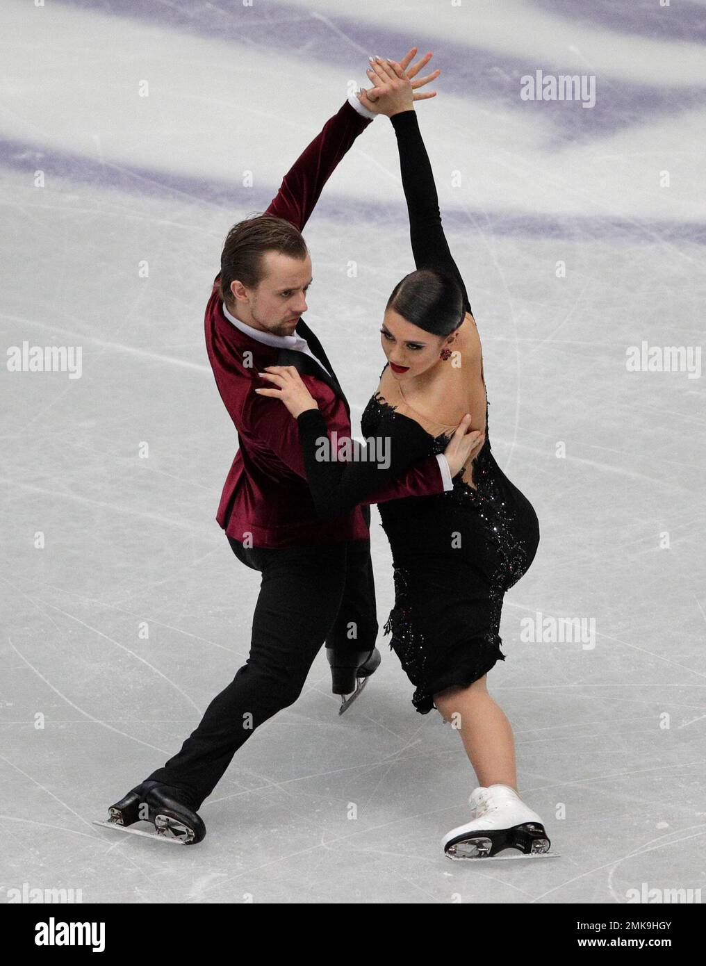 Kaitlin Howayek and Jean-Luc Baker of the U.S. perform their ice dance ...