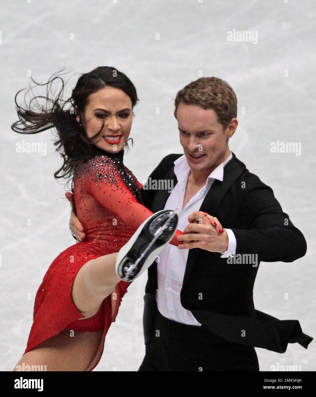 Madison Chock and Evan Bates of the U.S. perform their ice dance rhythm ...