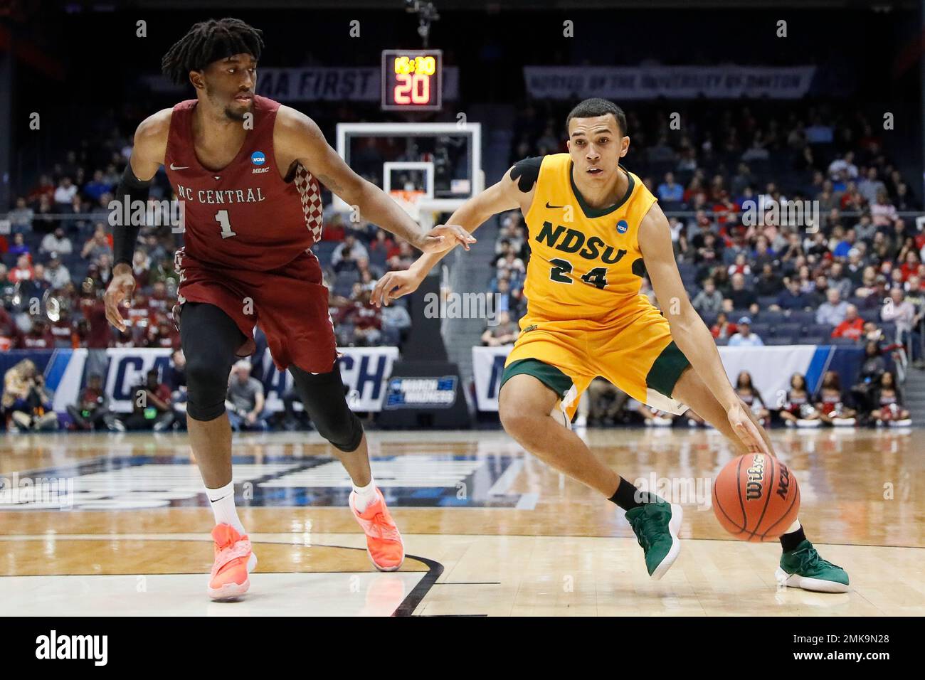 North Dakota State's Tyson Ward (24) drives past NC Central's Zacarry Douglas (1) during the ...