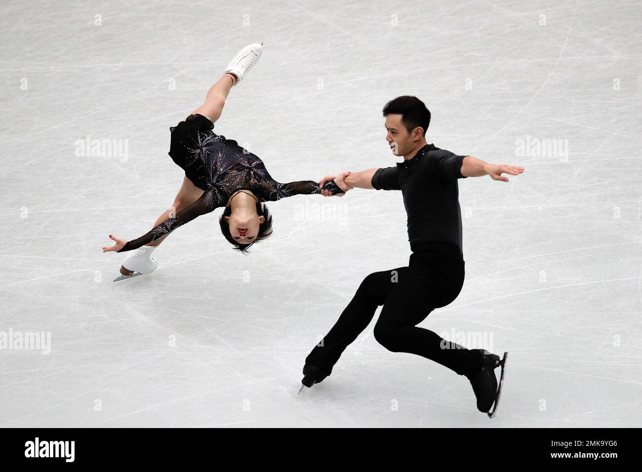 China's Peng Cheng and Jin Yang perform during the pairs short program ...