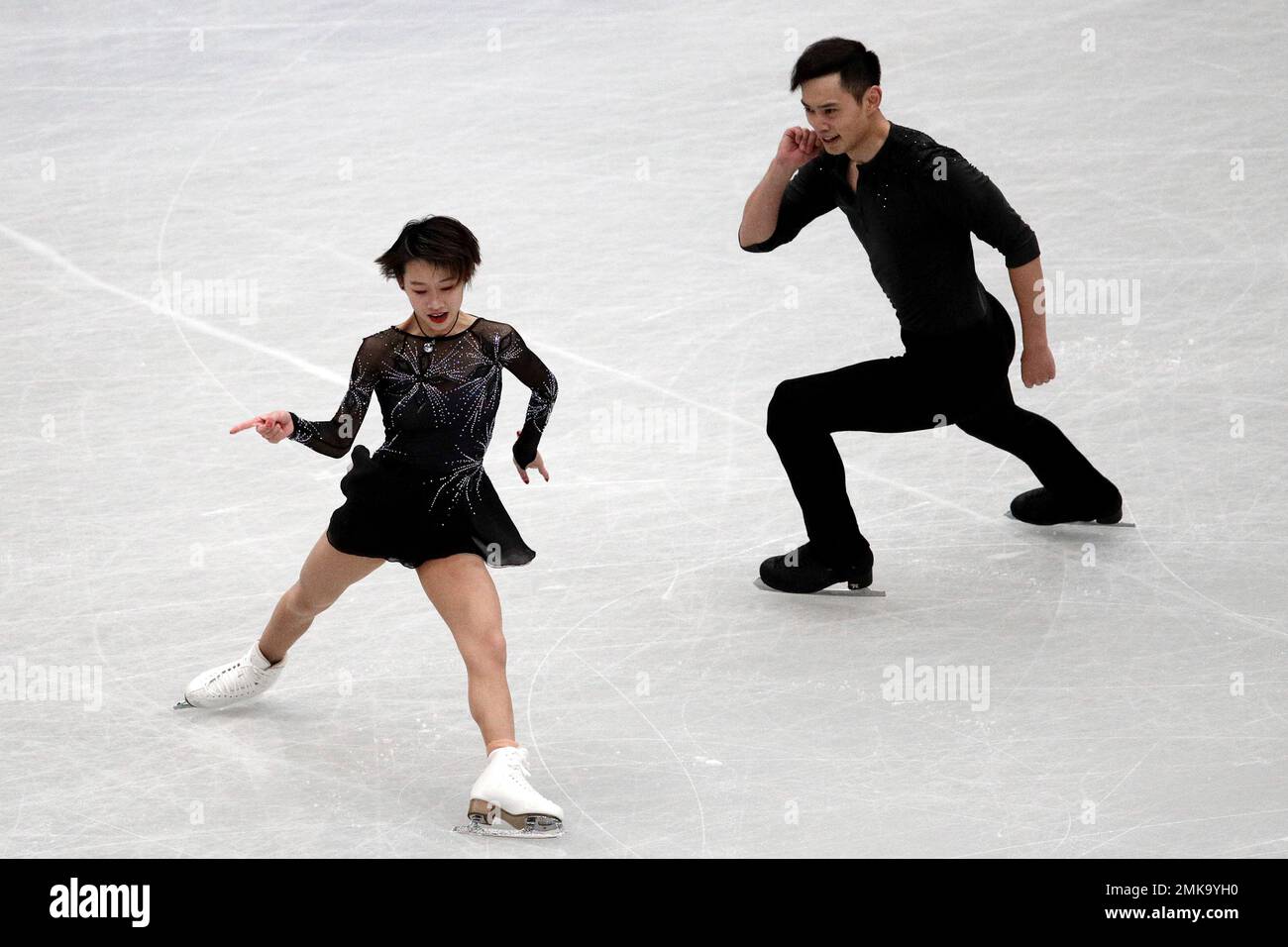 China's Peng Cheng and Jin Yang perform during the pairs short program ...