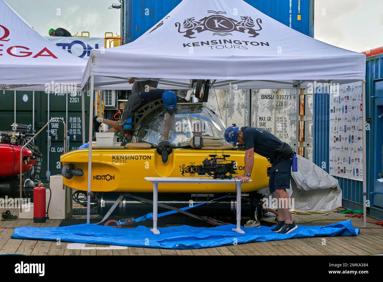 Crew inspect a submersible after a British scientist and her American ...