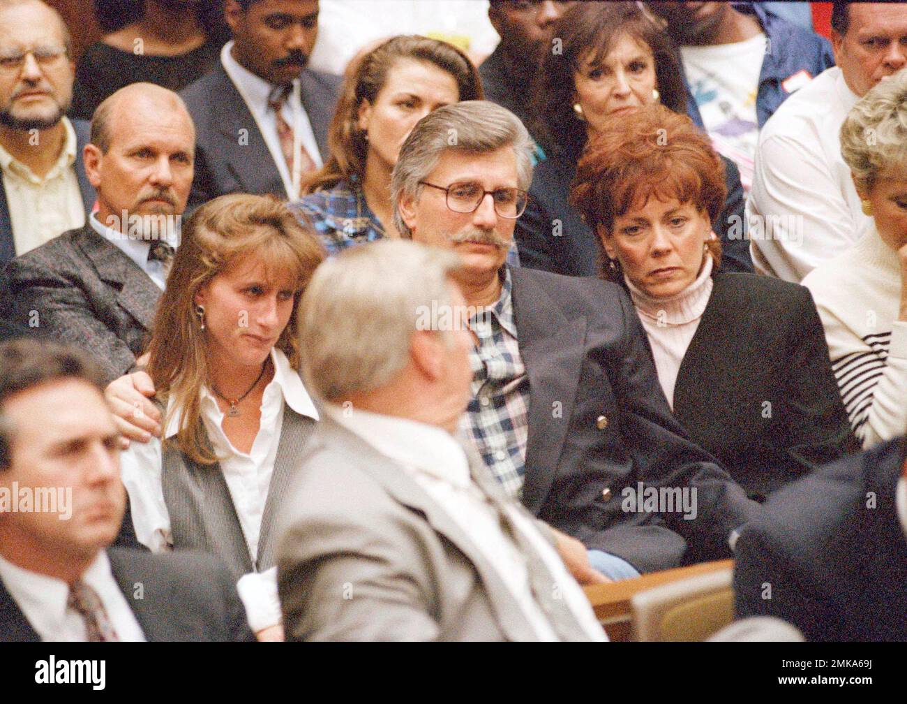 Los Angeles Police Department Det. Philip Vannatter, foreground, turns ...