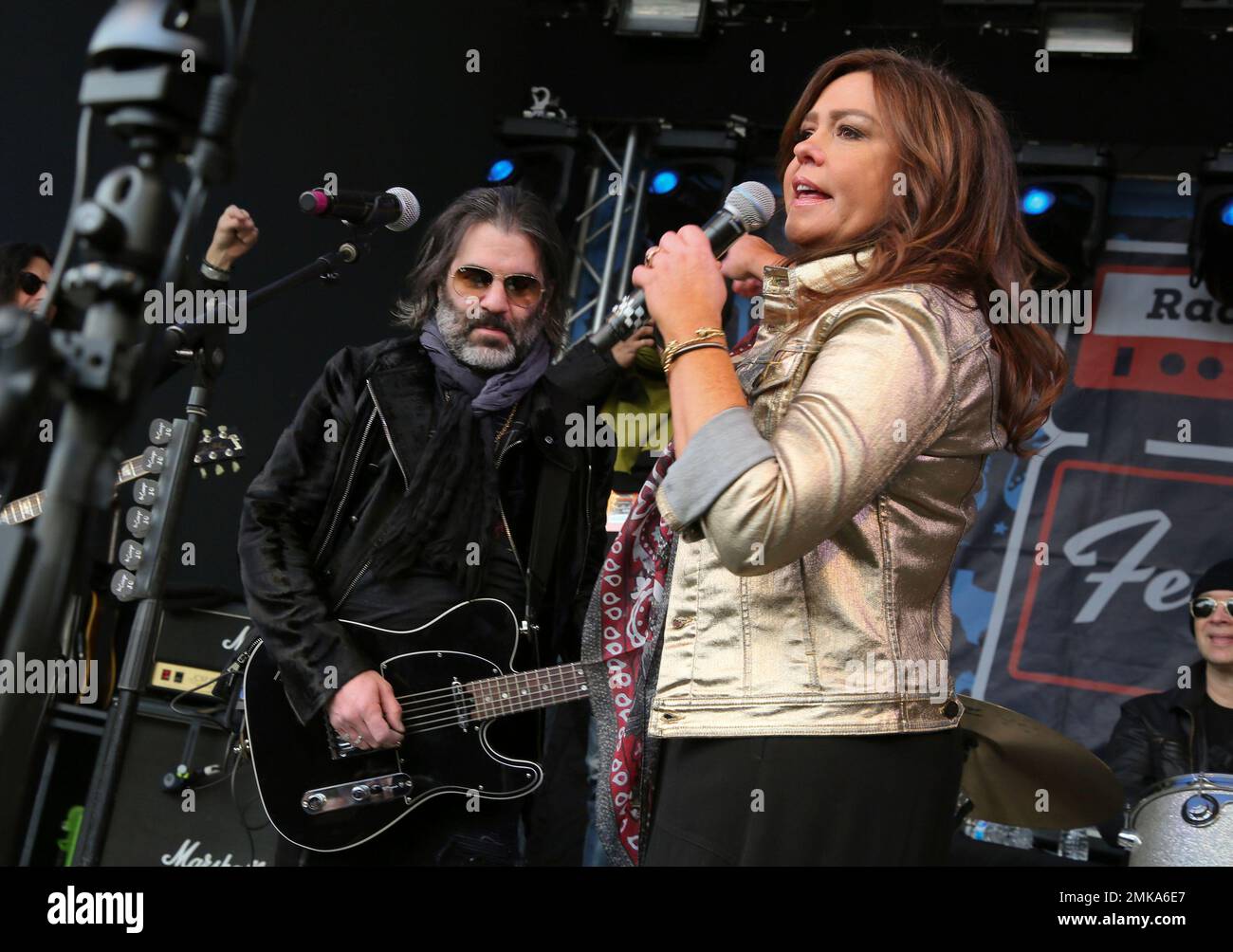 Rachael Ray, right, introduces her husband John Cusimano's band The ...