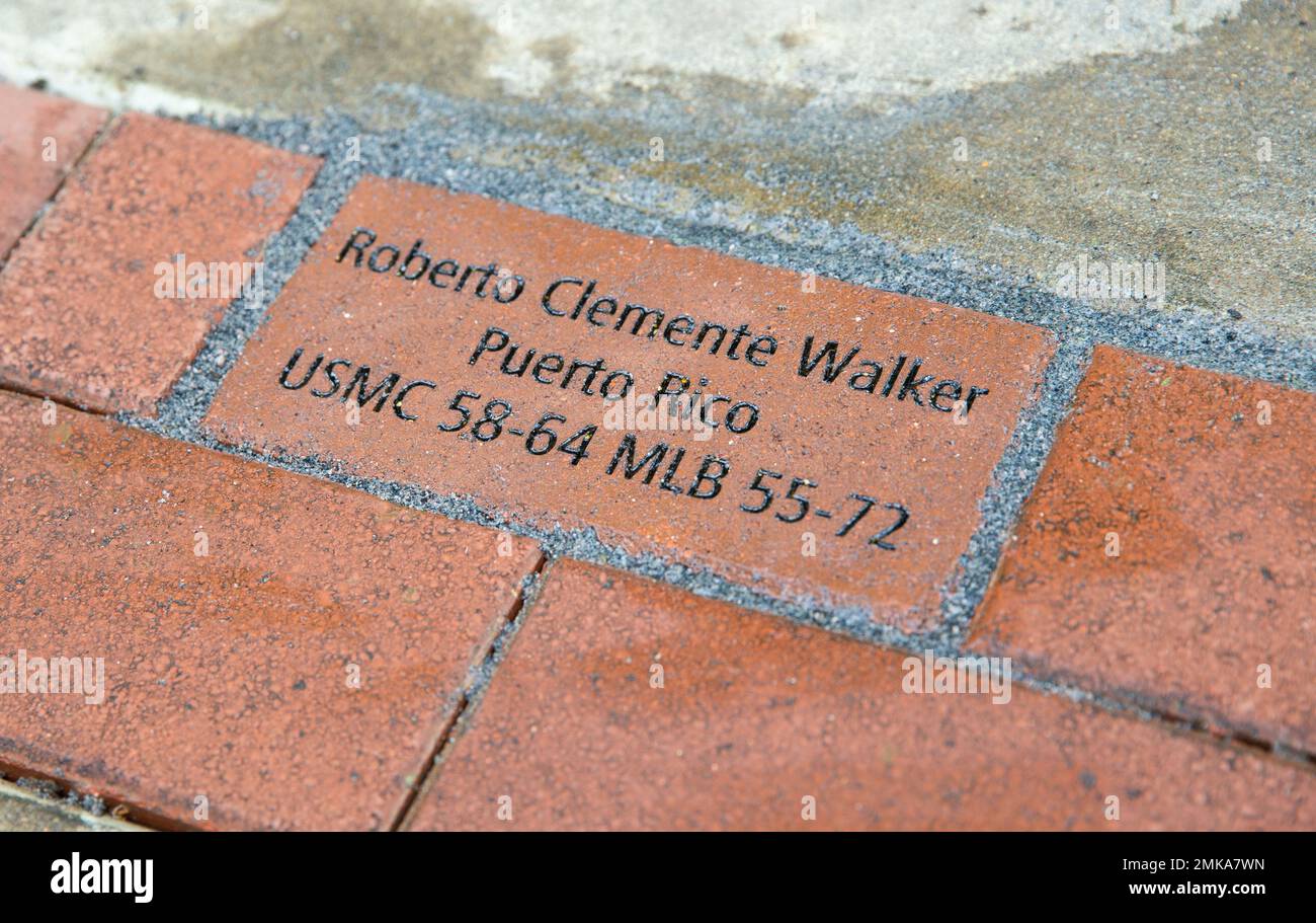 A freshly laid brick in memory of Roberto Clemente sits outside of the ...