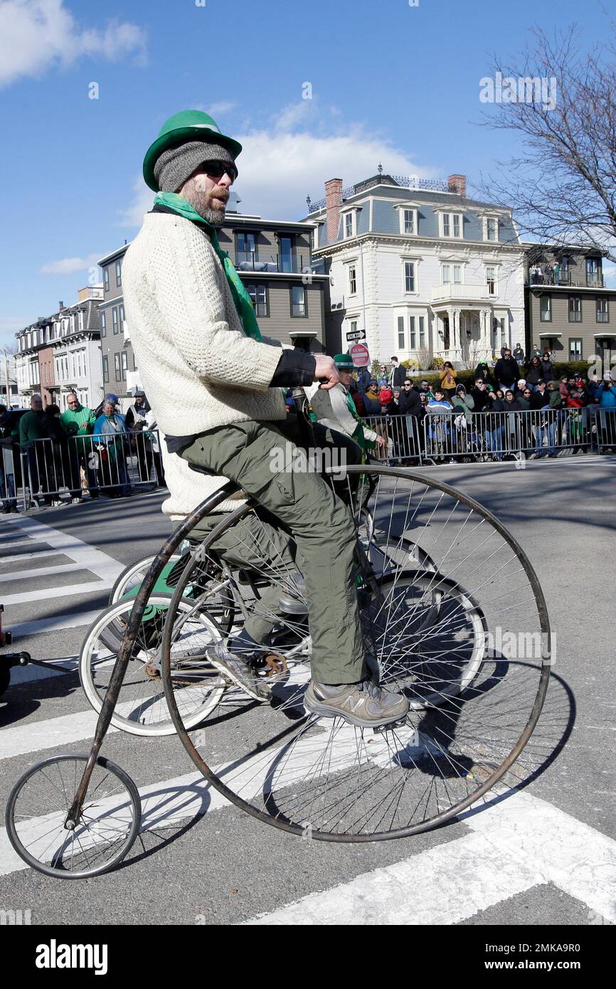 A member of the Cycling Murrays rides a penny farthing during the ...