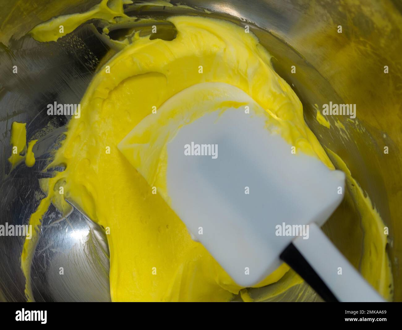 Yellow icing are making hi-res stock photography and images - Alamy
