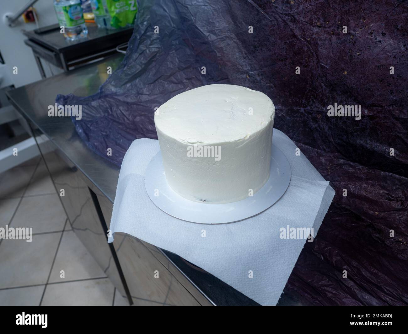 blank white frosted layered cake on stand ready for decoration Stock ...