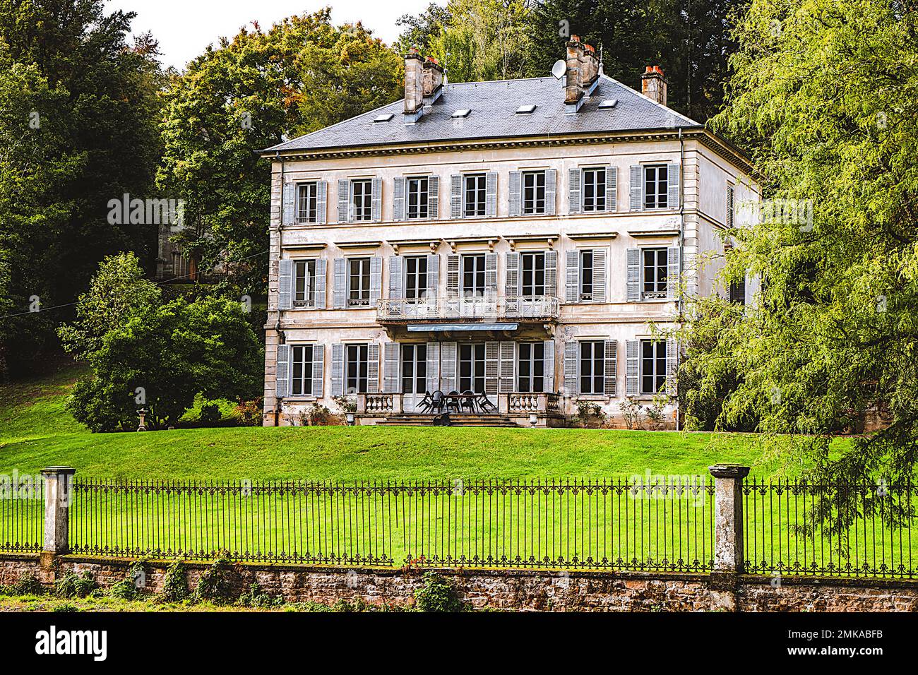 The manor house of Cendrecourt on the shore of the river Saone in the ...