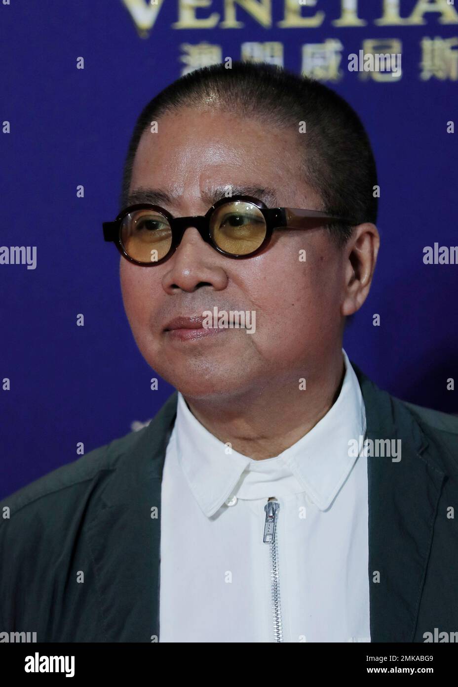 Hong Kong director Fruit Chan poses on the red carpet of the Asian Film ...
