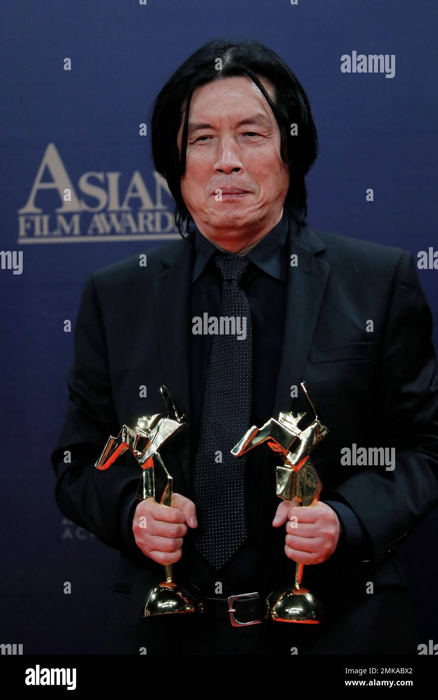 South Korea director Lee Chang-dong poses after winning the Best ...