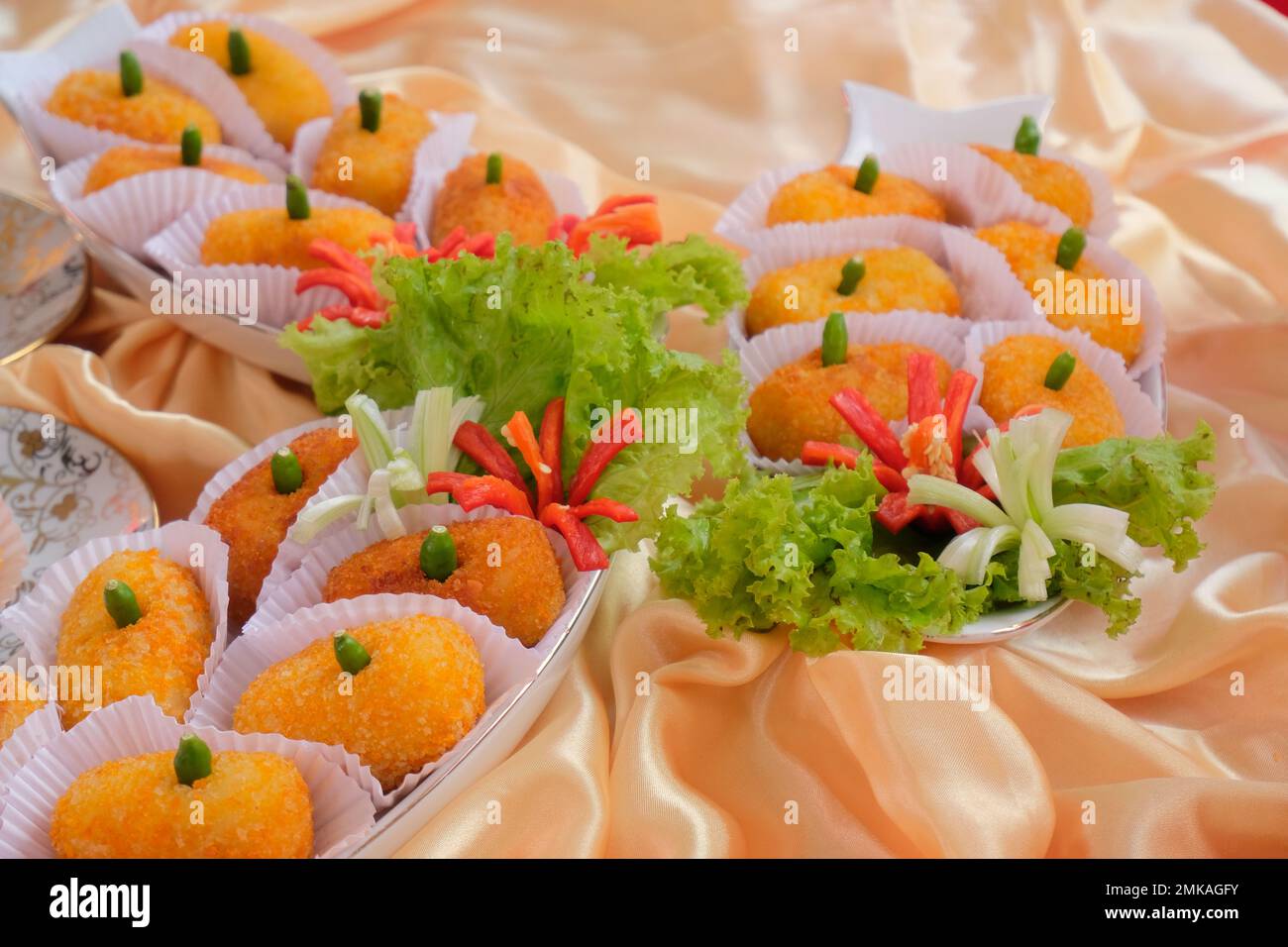 Kroket kentang is a traditional snack from Indonesia. served in wooden ...