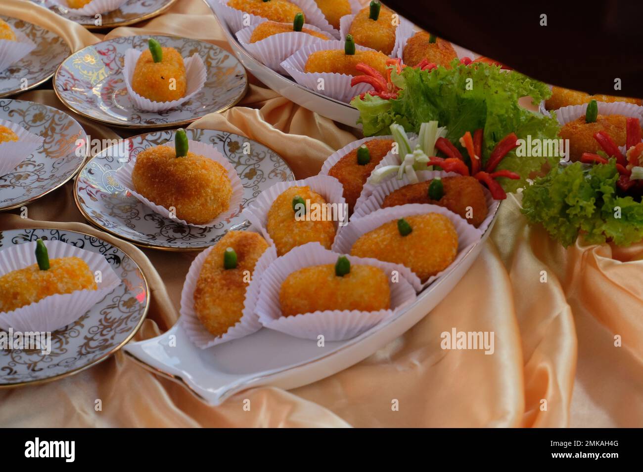 Kroket kentang is a traditional snack from Indonesia. served in wooden ...
